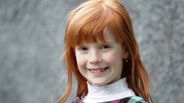 Little Ginger Girl's Face Smiling, Stock Footage | VideoHive