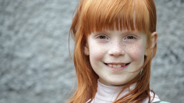 Little Ginger Girl's Face Smiling, Stock Footage | VideoHive
