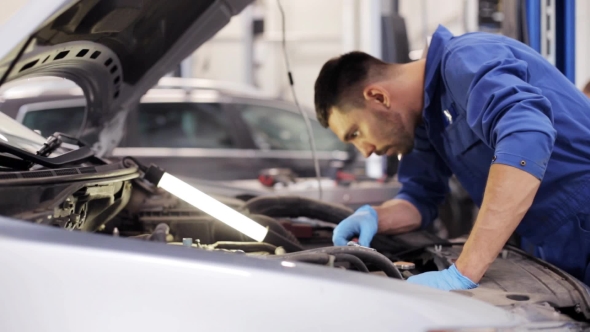 Mechanic Man With Lamp Repairing Car At Workshop 6, Stock Footage ...