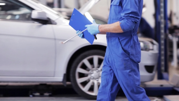 Mechanic Man With Wrench Repairing Car At Workshop 40, Stock Footage