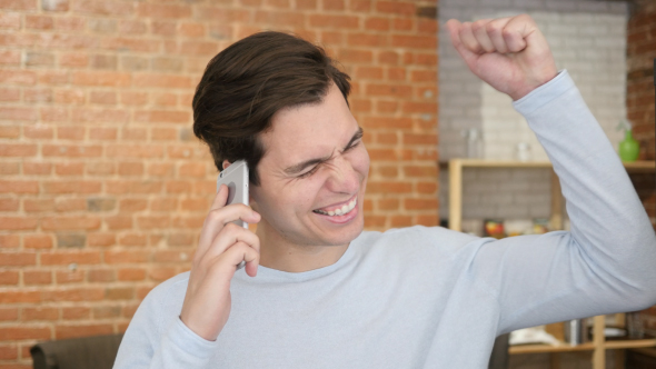 Excitement of Success during Phone CAll, Stock Footage | VideoHive