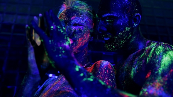 Tender Touch Of Loving Couple In Ultraviolet Light., Stock Footage