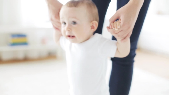 Happy Baby Walking With Mother Help At Home 16, Stock Footage | VideoHive