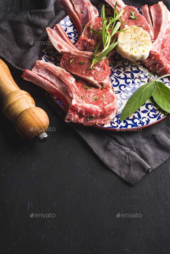 Raw uncooked lamb chops with herbs Stock Photo by sonyakamoz | PhotoDune