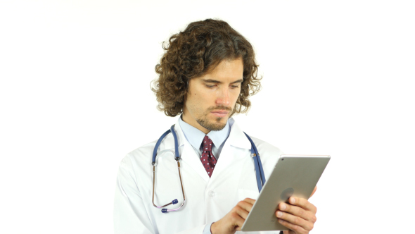 Doctor Online Browsing on Tablet Computer, Stock Footage | VideoHive