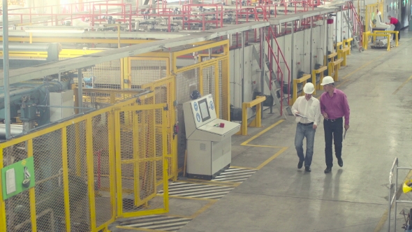 Engineers Walking Through Factory, Stock Footage | VideoHive