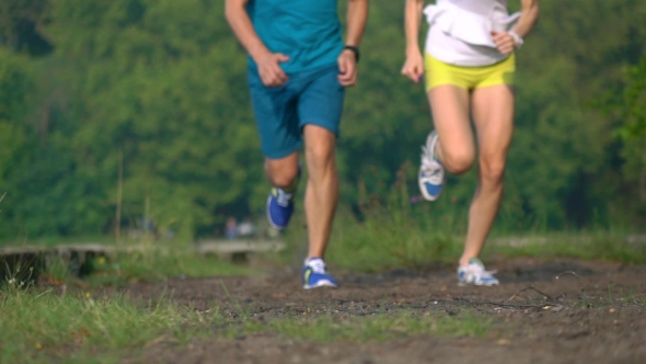 Athletic Girl And Man Running Together, Stock Footage | VideoHive