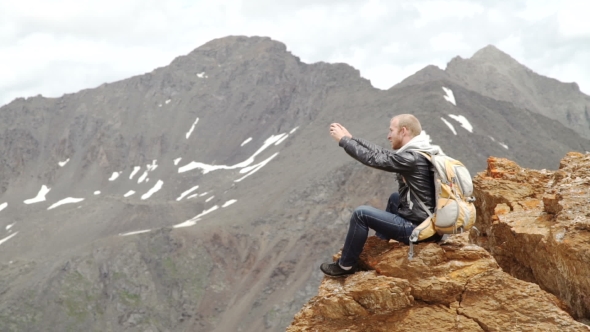 Strong Man Hiker Taking Photo With Smart Phone At Mountain Peak ...