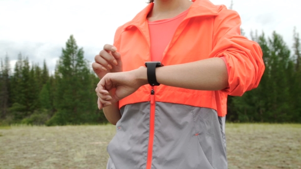 Runner Using Smartwatch Fitness Tracker And Heart Rate Monitor Watch ...