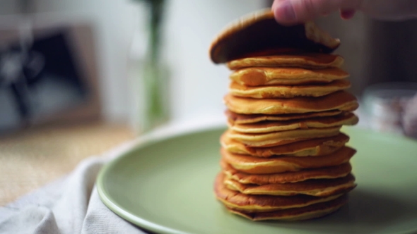 Man Take One Pancake From Stack Of Pancakes, Stock Footage | VideoHive