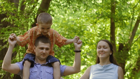 Family Having Fun In The Park At Sunset, Stock Footage | VideoHive