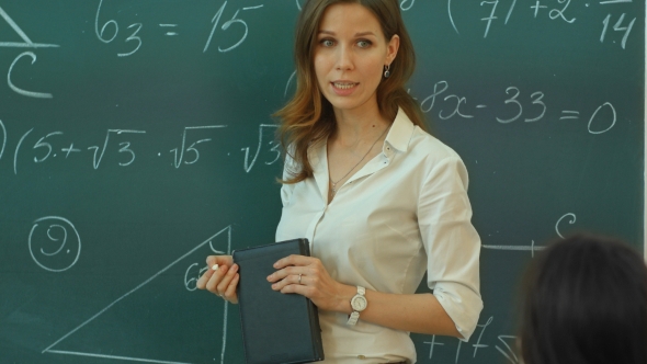 Teacher Doing Math On Chalkboard, Stock Footage | VideoHive