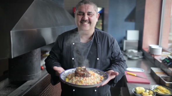The Chef Shows On Camera Plate Of Pilaf With Lamb., Stock Footage ...