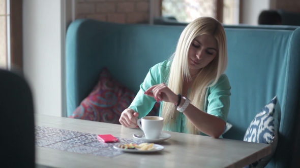A Woman Looking At Her Watch., Stock Footage | VideoHive