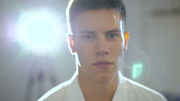 Portrait Of Handsome Master Of Taekwondo With Back Light, Stock Footage