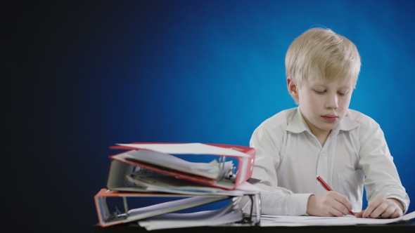 Thinking Boy Writing Writing Pen On Paper, Stock Footage | VideoHive