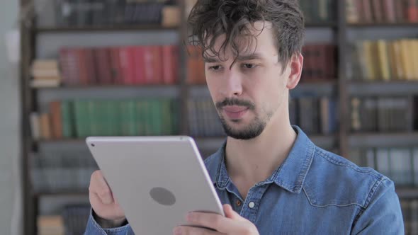 Sad Casual Young Man in Awe for Losing Online on Tablet, Stock Footage