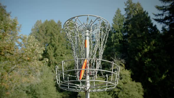 Frisbee Golf Basket Hole With Disk Hitting Chains, Stock Footage ...