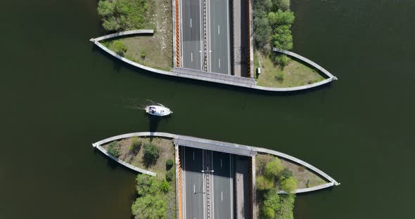 Aquaduct Veluwemeer water bridge with boat crossing above highway ...