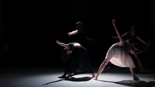 Contemporary Dance Moves of Five Dancers on Black, Shadow, Stock Footage