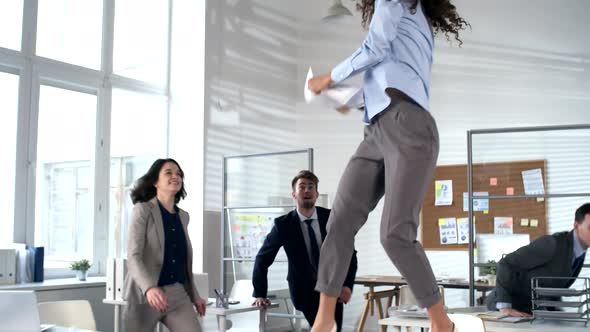 Businesswoman Dancing on Desk in the Office, Stock Footage | VideoHive