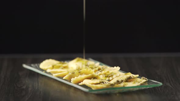 A cook finishes decorating the perfect dish for his gourmet kitchen ...