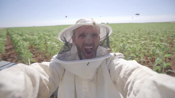 Beekeeper recording himself, Stock Footage | VideoHive