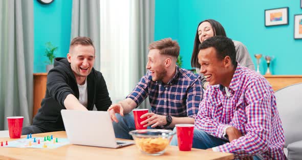 Happy Diverse Friends Watching Funny Video Laughing at Joke Using ...