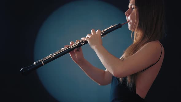 Musician Girl Playing an Oboe, Stock Footage | VideoHive