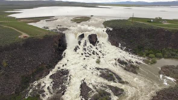 Aerial view of huge overflow waterfall at Magic Reservoir, Stock Footage