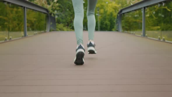 Close-up woman feet running, back view., Stock Footage | VideoHive