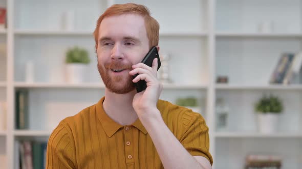 Portrait of Cheerful Redhead Man Talking on Smartphone, Stock Footage