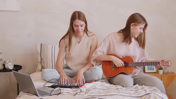 Happy Twin Sisters Playing Musical Instruments, Stock Footage | VideoHive