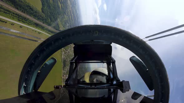 The Airplane Makes a Loop in the Air and Makes Maneuvers Flying Over ...