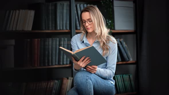 Pensive Blonde Casual Woman Reading Vintage Paper Book at Home Public ...