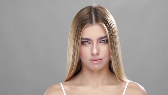 Angry Model Looking To Camera with Water Splashes Around, Stock Footage