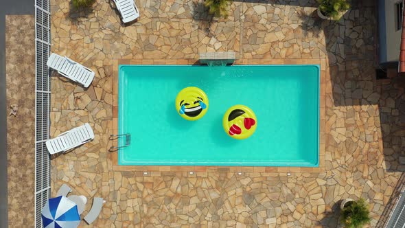 Float smile emoji emoticon icon buoy at swimming pool at countryside ...