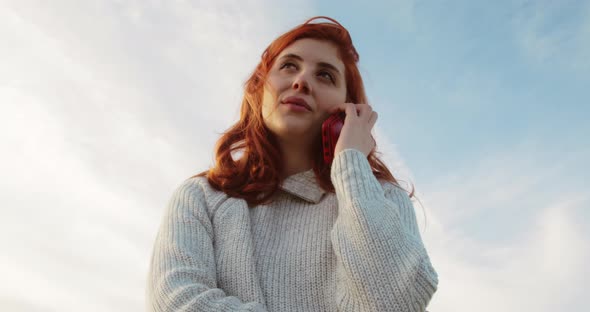Young Girl Talks on the Phone with Her Mom in the Nature, Stock Footage