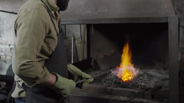 Blacksmith Forging Billet in Stove, Stock Footage | VideoHive