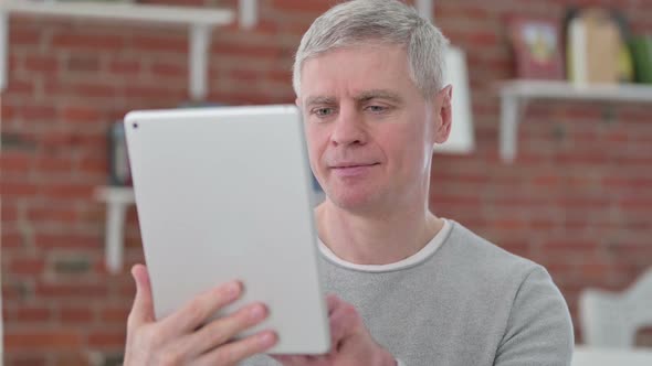 Serious Senior Old Man Using Tablet, Stock Footage | VideoHive