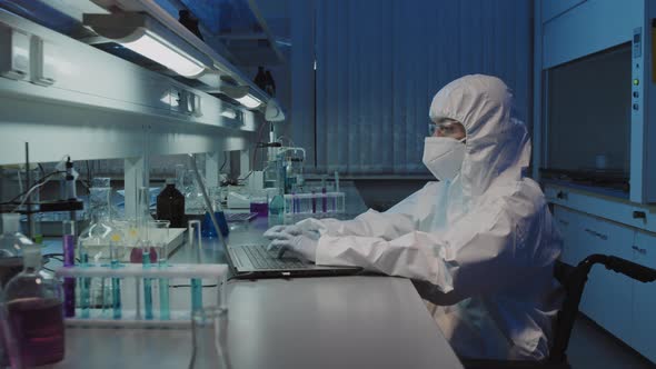 Epidemiologist in Wheelchair Working in Lab, Stock Footage | VideoHive