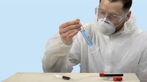 Young Scientist Shaking Test Tube with Medicine, Stock Footage | VideoHive