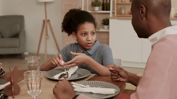 Daughter Asking Father Question at Table, Stock Footage | VideoHive