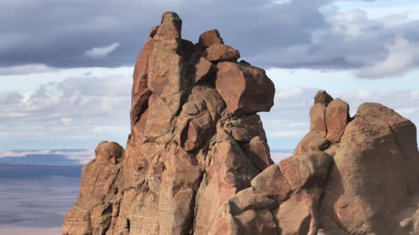 Close Up View of High Cliffs with Mountain and Cloudy Sky on Motion ...
