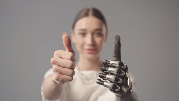 Woman with Bionic Arm Showing Thumbs Up, Stock Footage | VideoHive