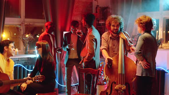 Young People Chatting and Having Fun on Concert Afterparty, Stock Footage