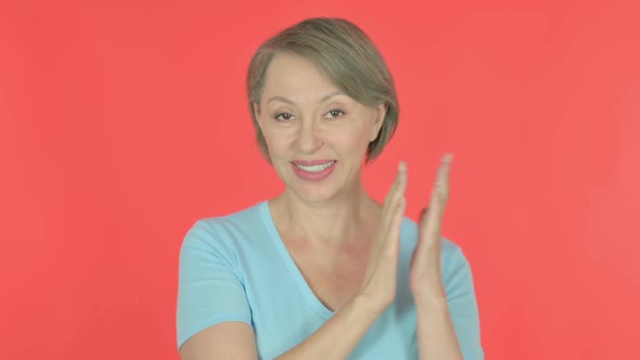 Old Woman Clapping Applauding on Red Background, Stock Footage | VideoHive