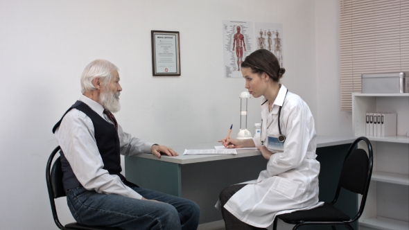 Patient Talking Serious Conversation To Healthcare Professional., Stock ...