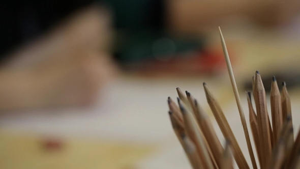 Unfocused View Of Male Student Drawing Picture., Stock Footage | VideoHive