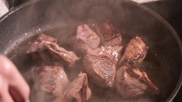 Frying Meat on Hot Pan, Stock Footage | VideoHive